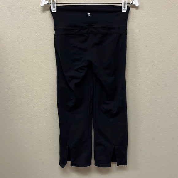 Athleta | Pants & Jumpsuits | Athleta Power Up Capri Pants With Back ...